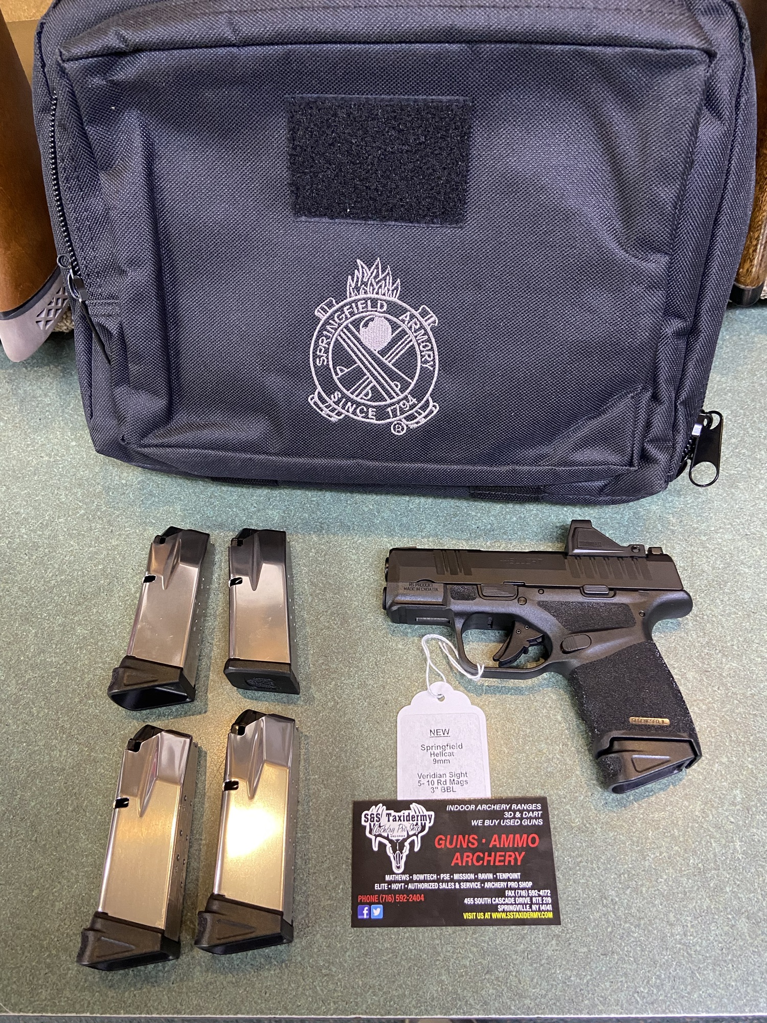 A Springfield Hellcat Gear Up Pack, 5 Mags and a Viridian Green Dot is ...