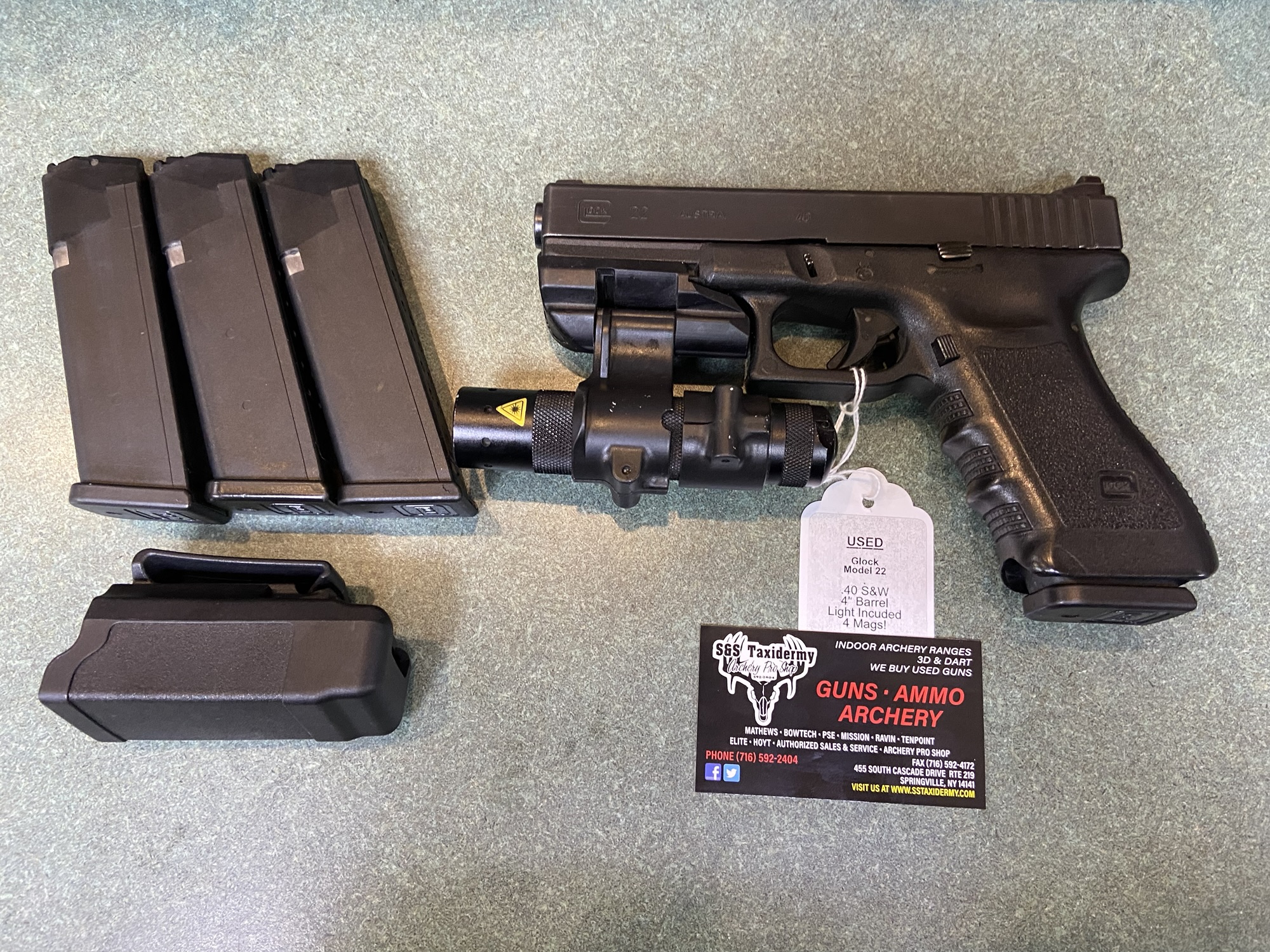 Here’s a great deal! A Glock 22 with 4 mags, a light attachment and a ...